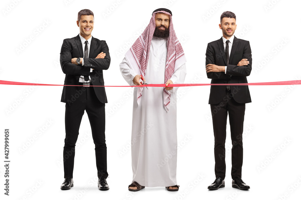 Saudi arab man cutting a red ribbon and two men in black suits Stock ...