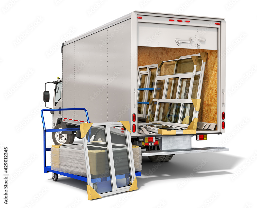 PVC windows are loading from cart to the back of a truck, windows ...