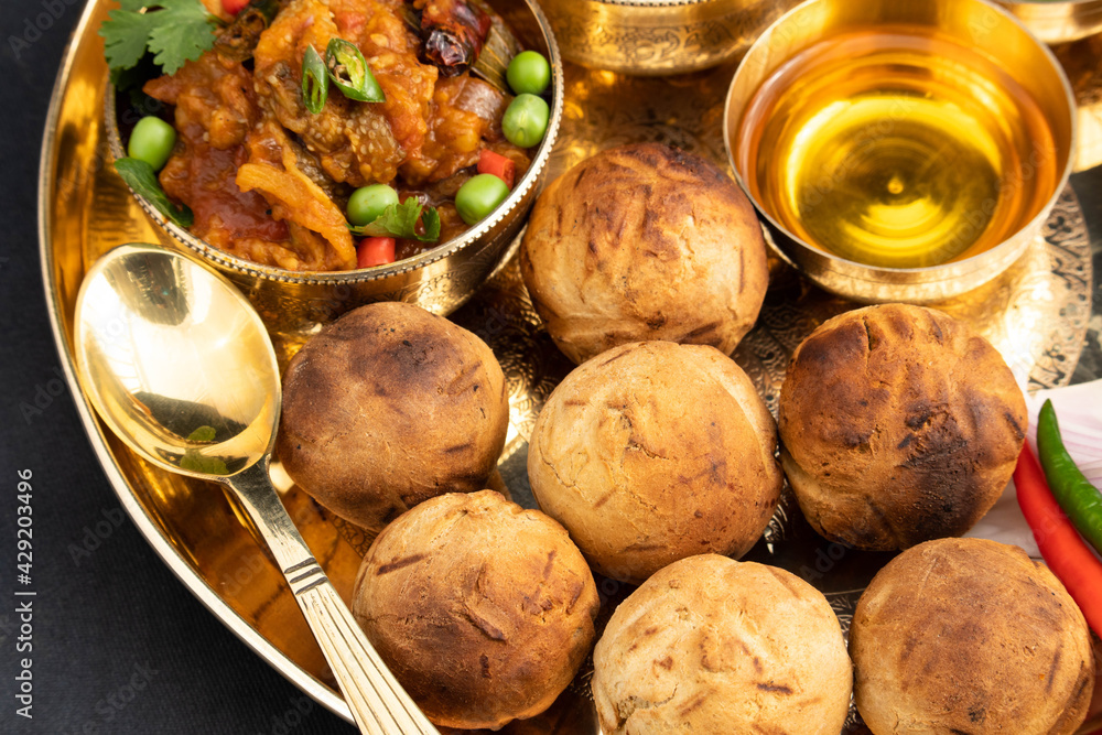 Litti Or Liti Chokha - Round Wheat Dough Drenched In Desi Ghee And ...
