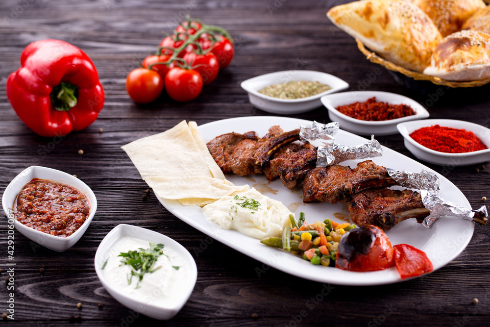Assorted Middle Eastern and arabic dishes on a dark rustic background ...