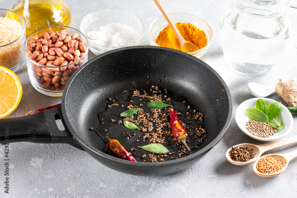 Preparation lemon rice traditional south Indian food. Chitranna or ...