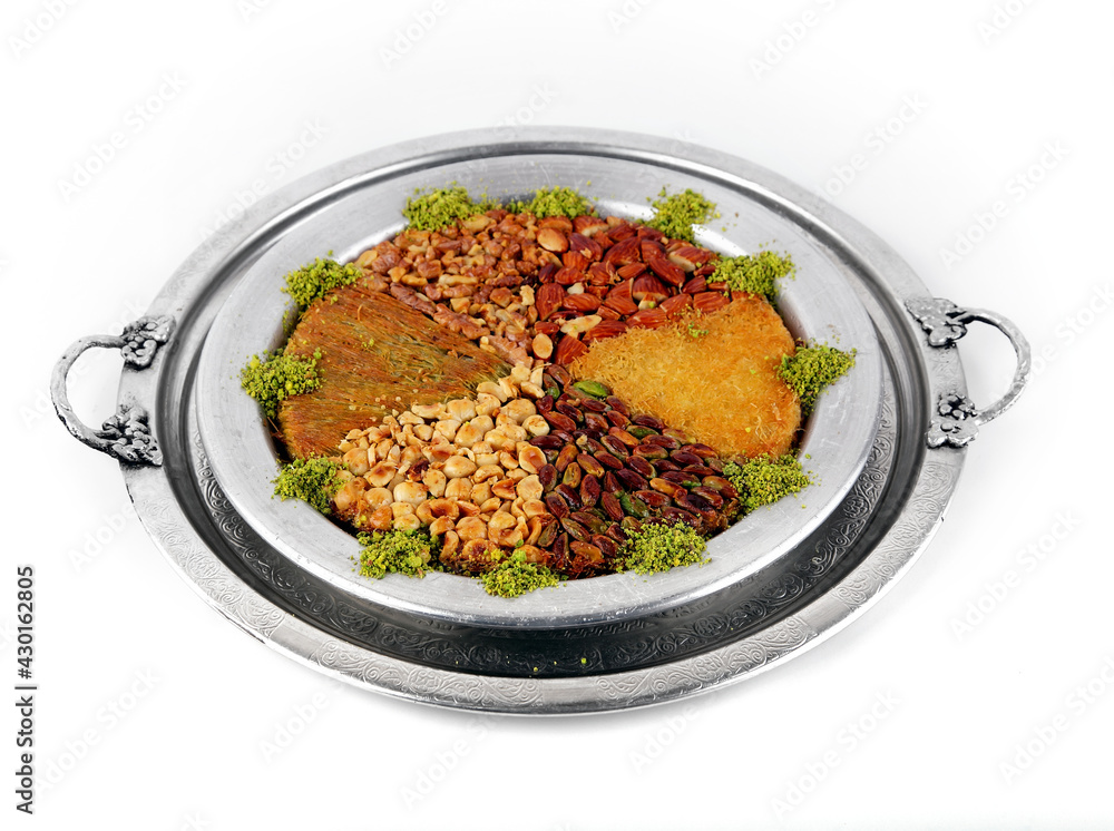 Turkish dessert kunefe, kunafa, kadayif with pistachio powder and ...