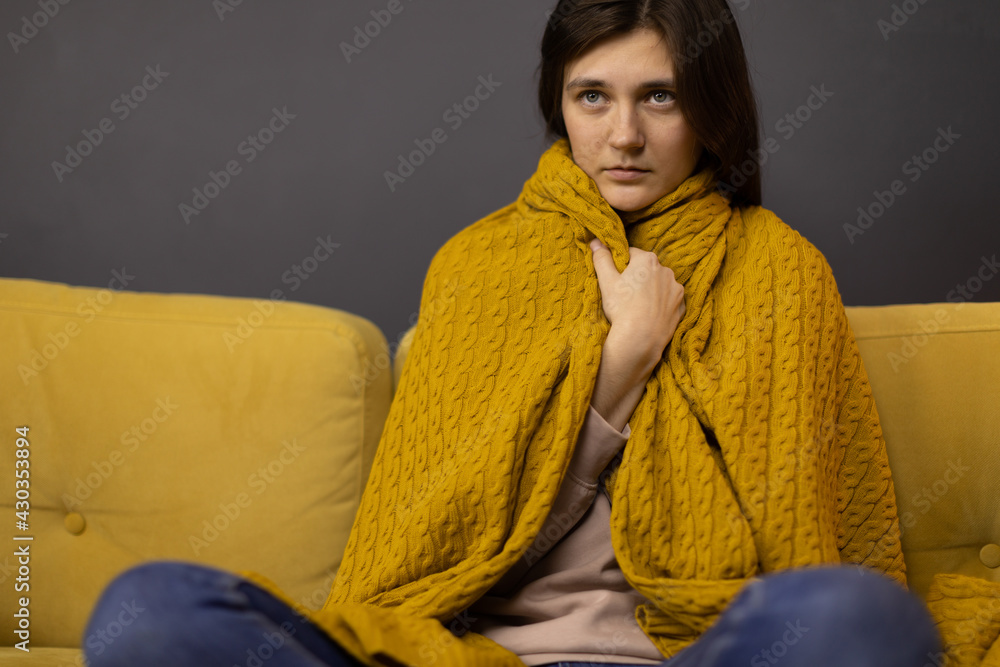 Attractive long-haired brunette girl suffering from depression sitting ...