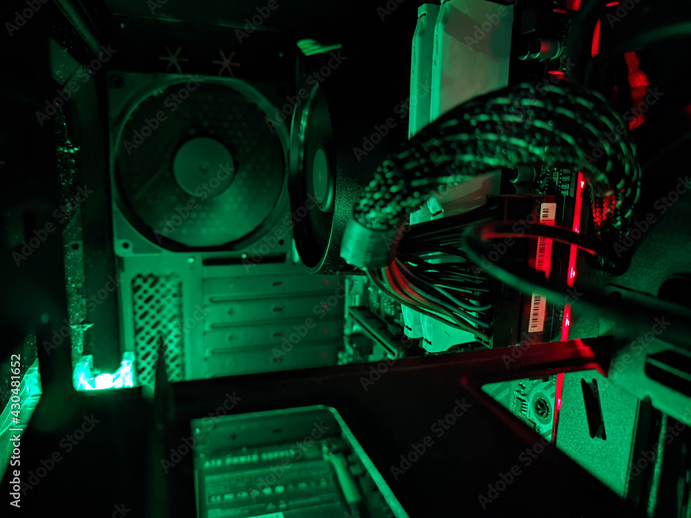 Foto cooling fan with backlight in the computer system unit. desktop ...