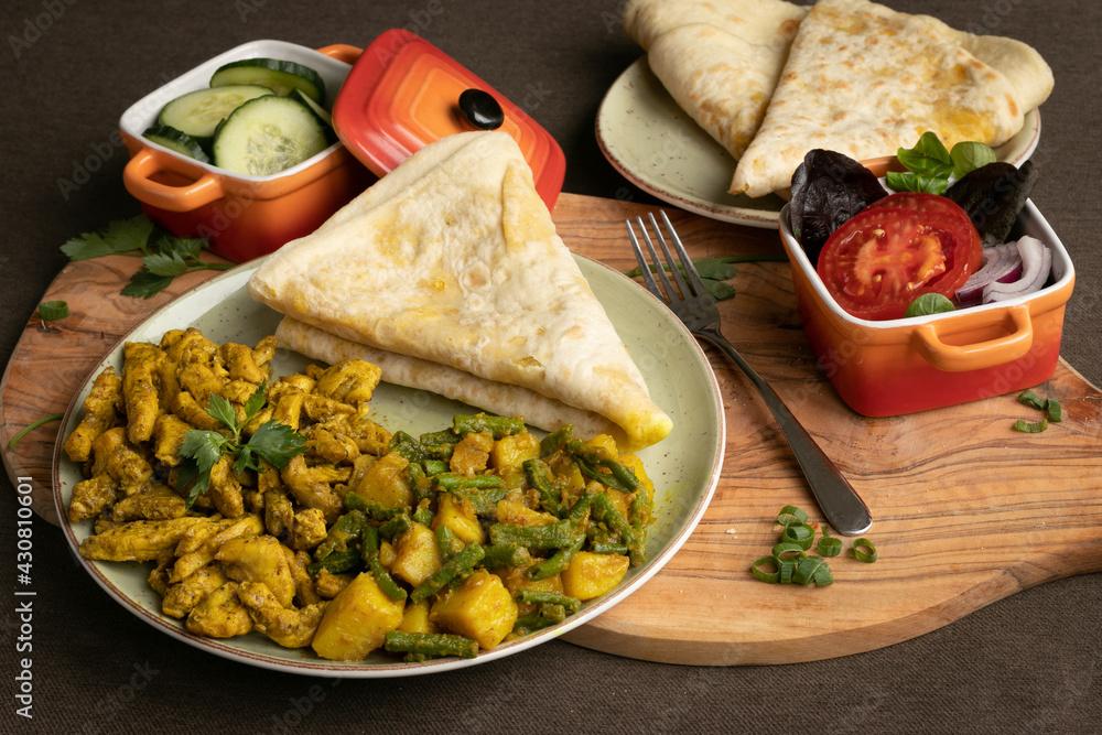 Indian-surinamese spicy food lunch and dinner, roti chicken curry Stock ...