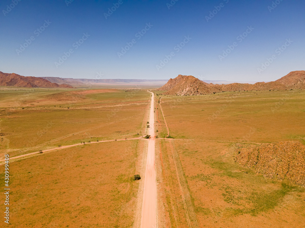Aerial view of Tirasberg Conservancy desert park landscape with roads ...