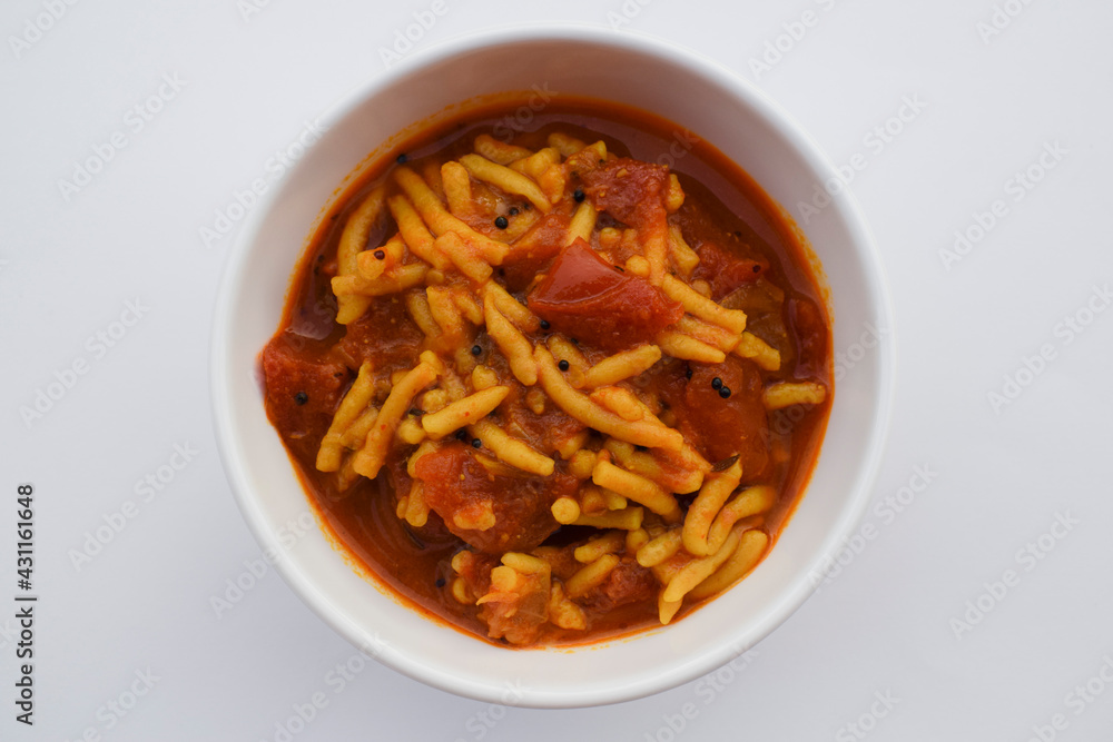 Photo Stock Gujarati popular side dish Sev tameta or Shev tamatar Curry ...