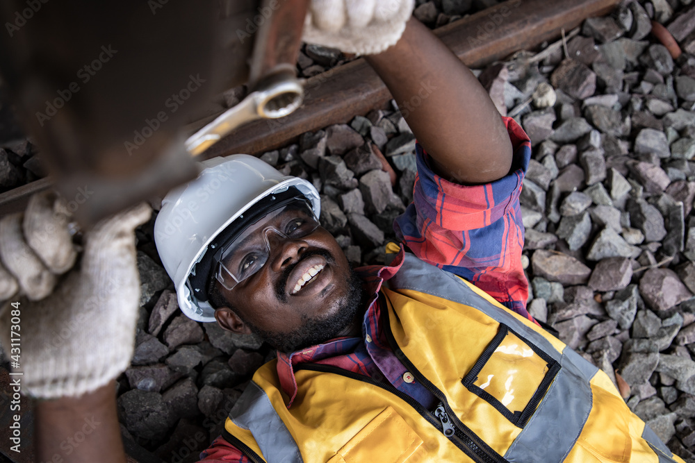 Handsome Africa American industrial engineering maintenance lie and fix ...