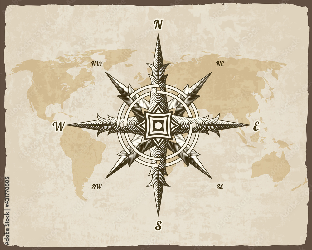Nautical antique compass sign on old paper texture world map with torn ...