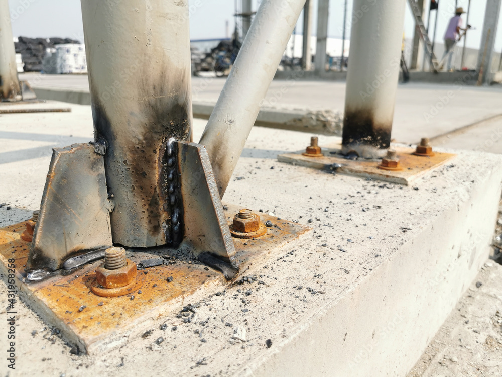 Stock-Foto „Stiffener plates on pipe column, anchor bolts installed on ...