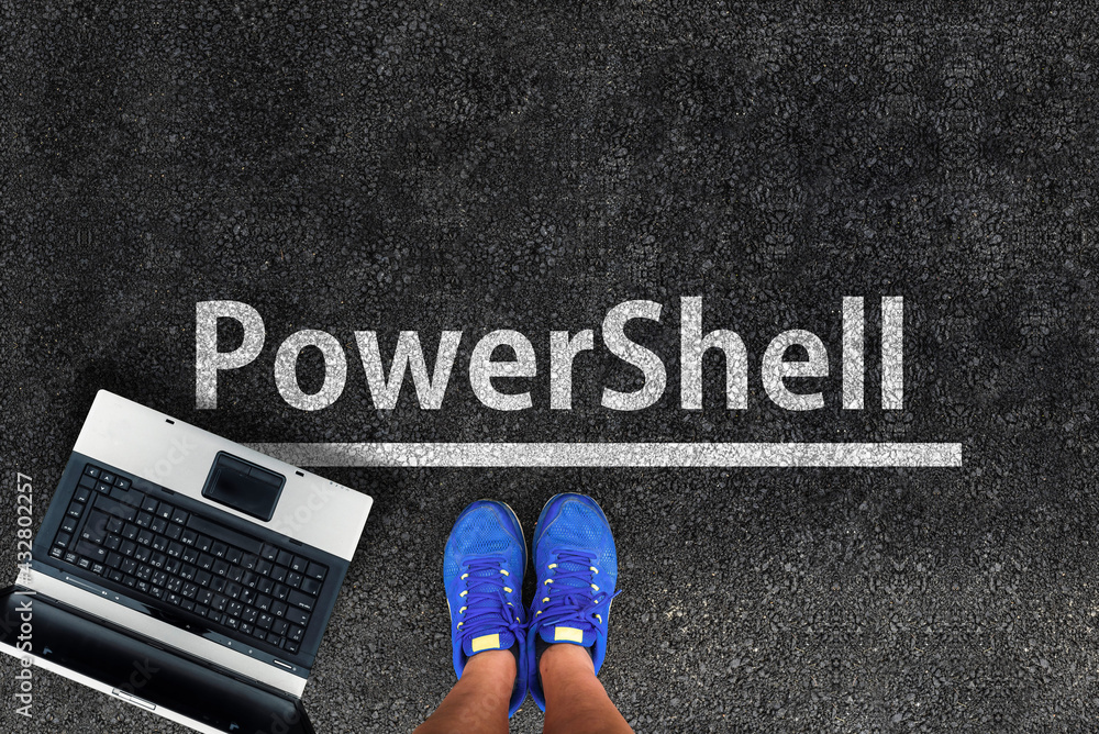 PowerShell Programming Language. Legs in sneakers standing next to ...