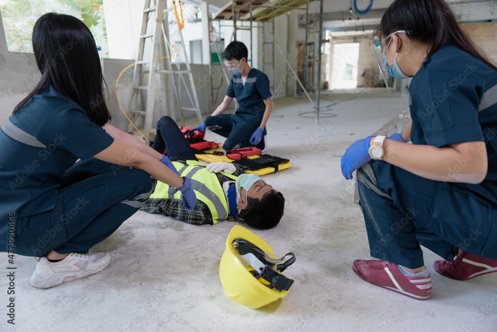 Emergency Medical First aid for head injuries of worker accident in ...
