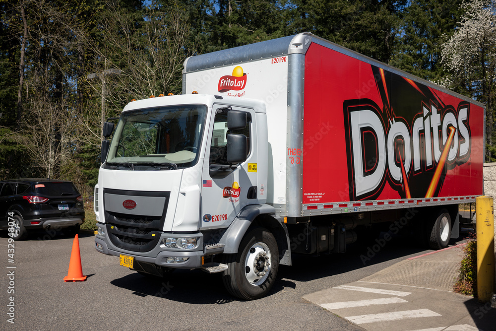 Lake Oswego, OR, USA - Apr 15, 2021: A Doritos branded delivery truck ...