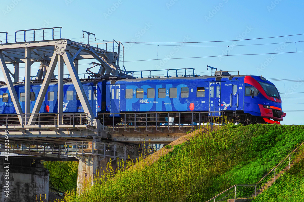 Moscow, Russia - May, 2021: Commuter train EP2D Rex on the railway ...