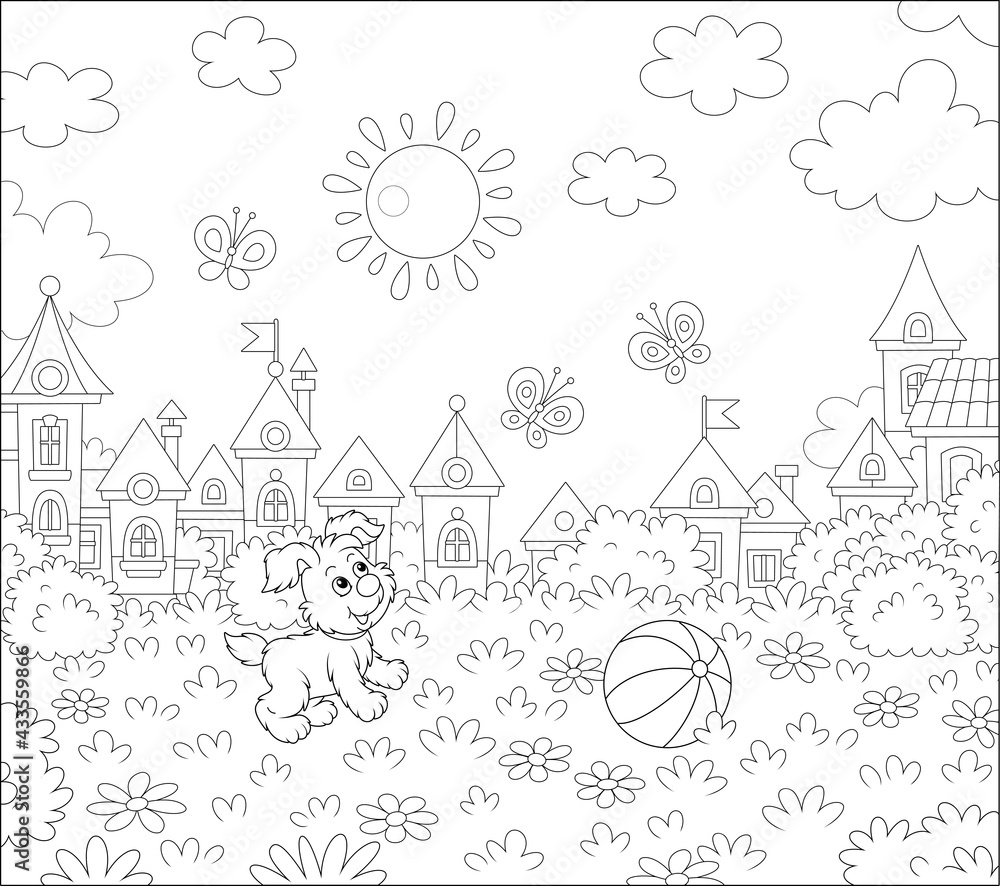 Happy little puppy playing with merry butterflies on grass of a sunny ...