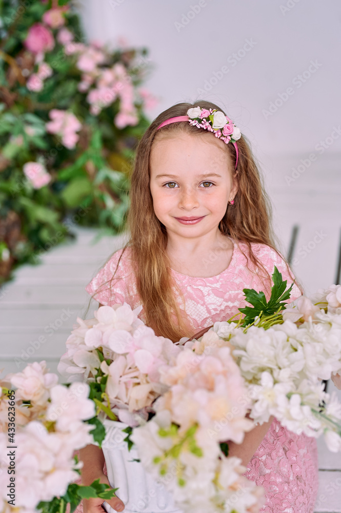 girl with loose hair all in the colors of beautiful white flowers ...