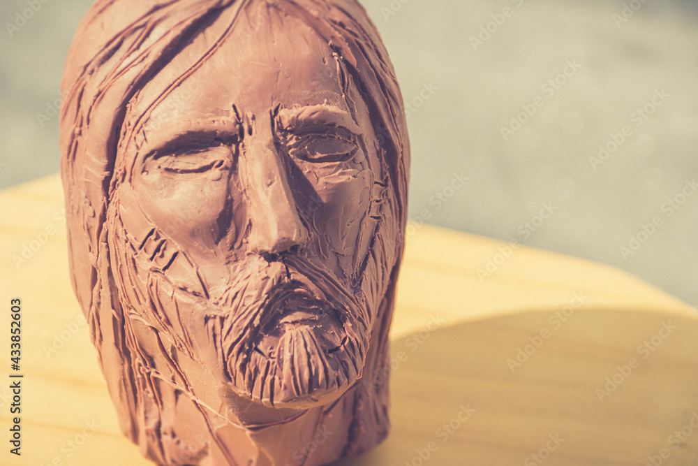 Jesus Christ face clay sculpture Stock Photo | Adobe Stock