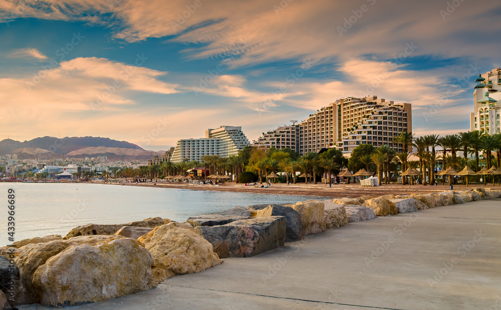 Coastal landscape with view on Eilat from walking stone pier of central ...