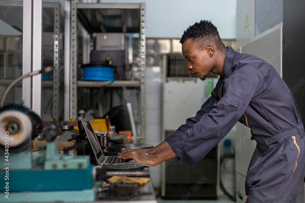 African American mechanic engineer worker wearing safety equipment ...
