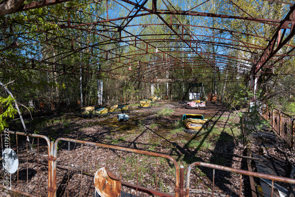 Old broken radioactive cars in amusement park. the most famous ghost ...