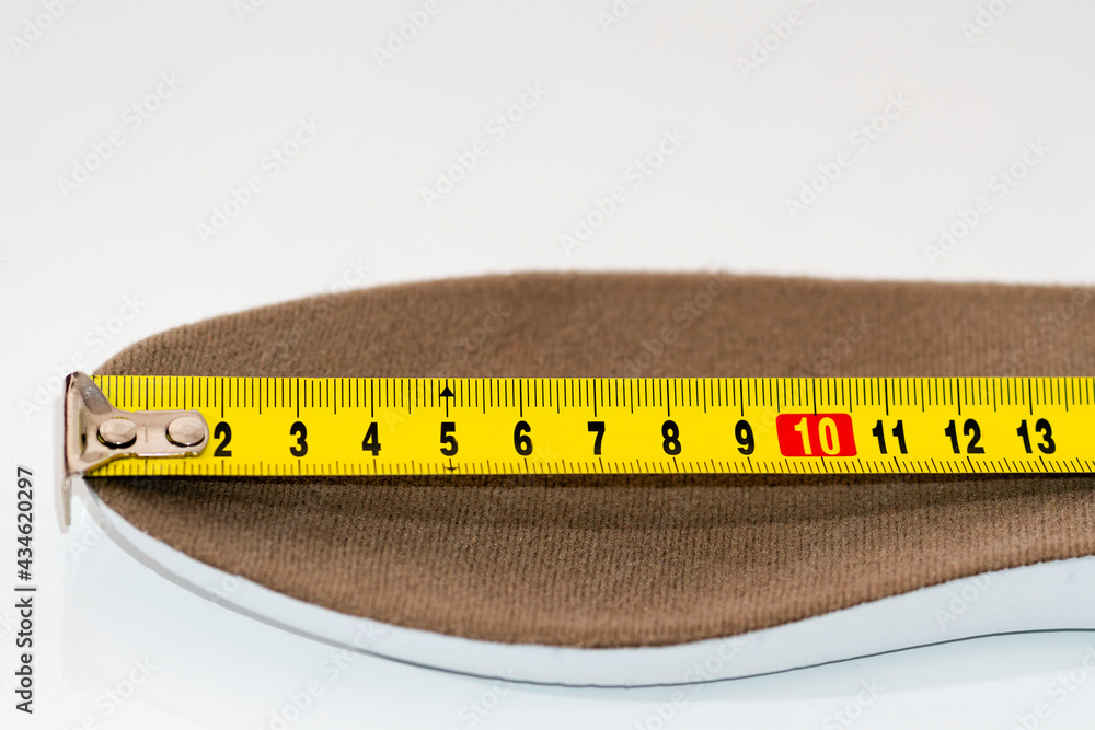 Shoe size measurement. Measure tape measure insoles. shoes size concept ...