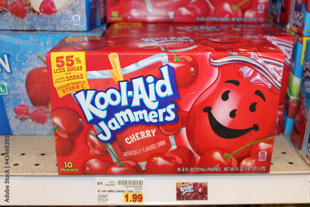 Kool-Aid Jammers Cherry flavor pouches in boxes shot closeup on a metal ...