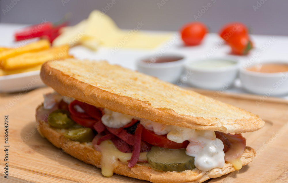 It is a famous Ayvalik Toast Turkish sandwich , it's full of delicious ...