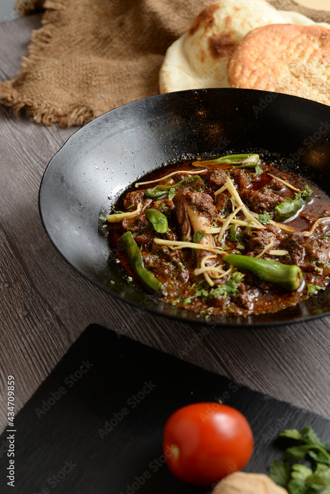 Chicken karahi with roghni naan and salad, desi food in Lahore Pakistan ...