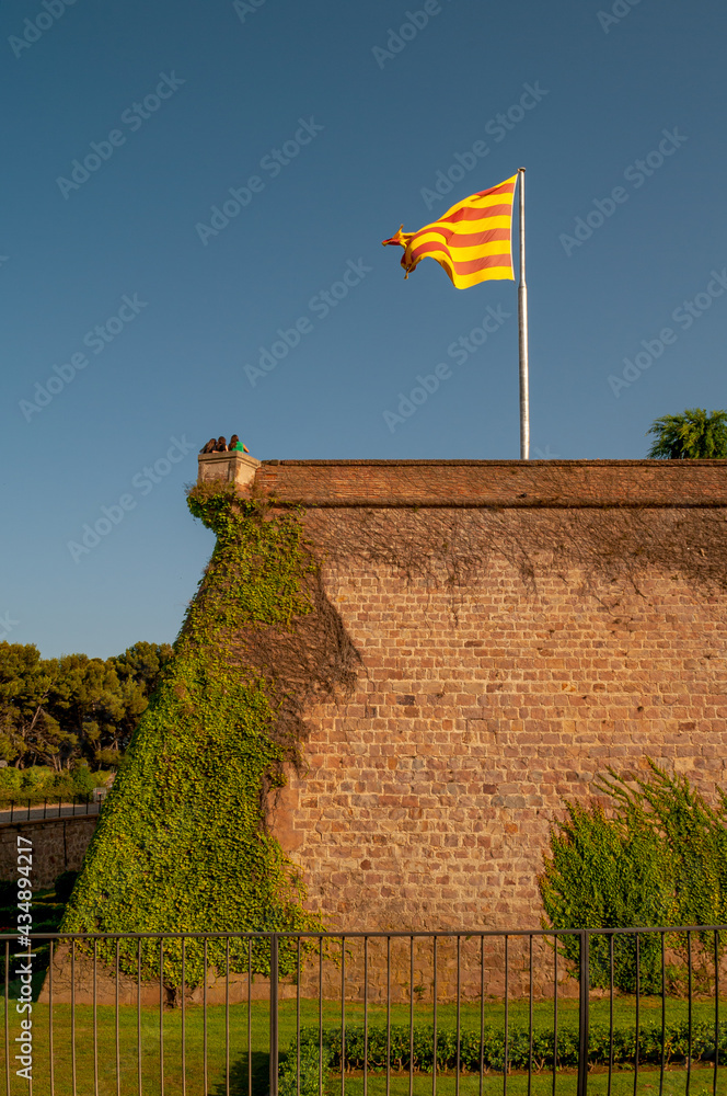 Montjuïc Castle with Catalan National Flag in historical downtown of ...
