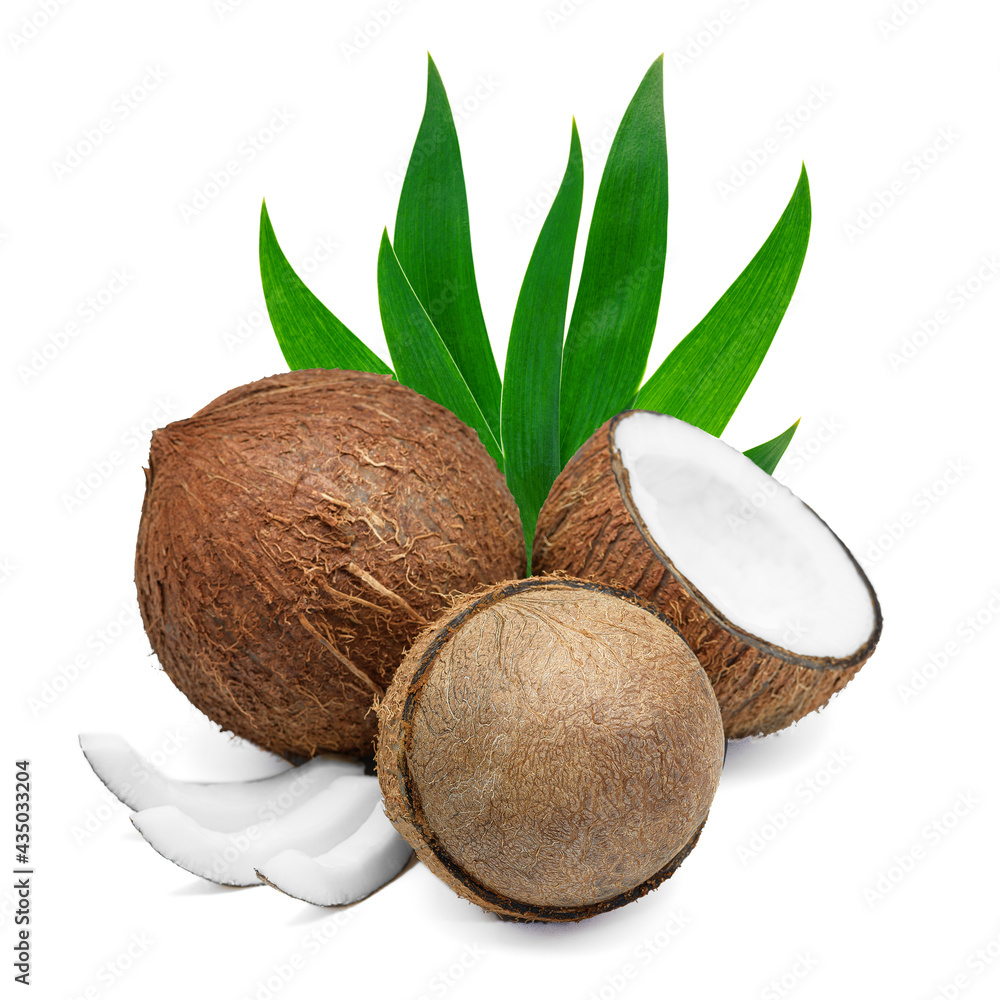 three different-sized coconuts with coconut pulp and green juicy ...