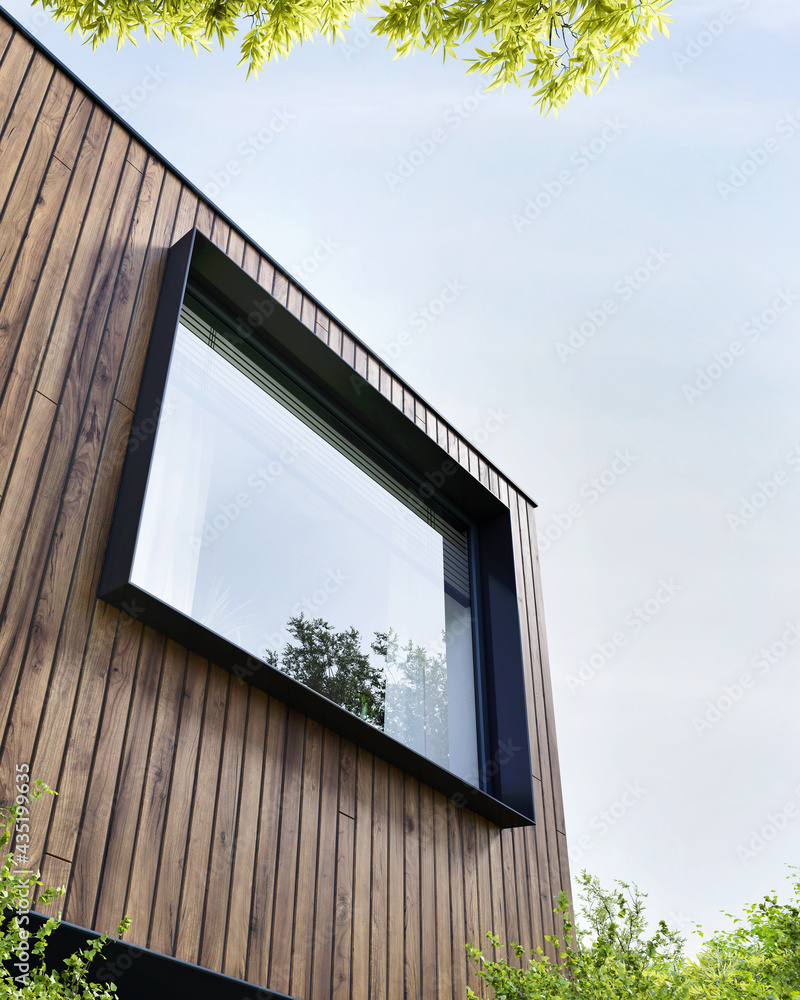 Steel window surround in a modern house with timber cladding Stock ...