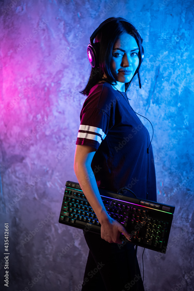 Photo Stock Beautiful Friendly Pro Gamer Streamer Girl Posing With a ...