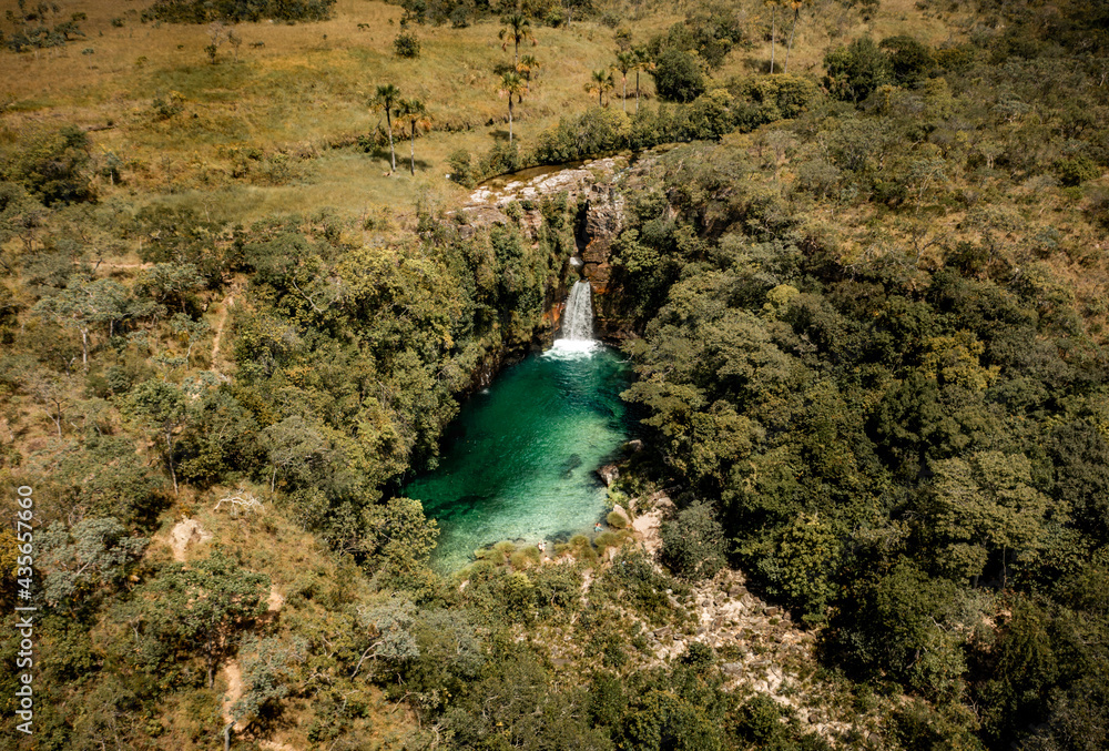 aerial image of the Rei do Prata Waterfall in Chapada dos Veadeiros ...