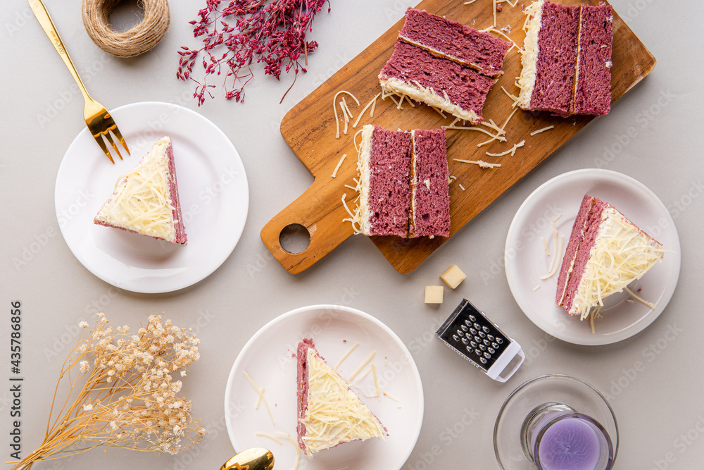 Foto de Stock Taro Cheesecake is a sweet dessert consisting of two ...