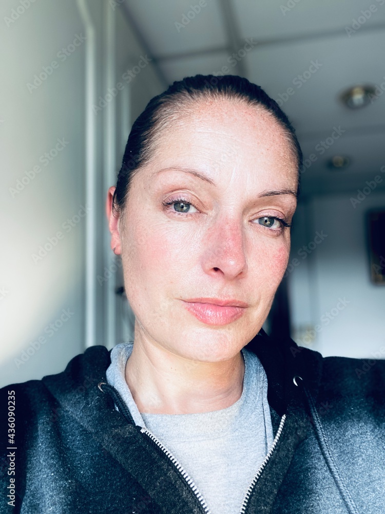 depressed 40 year old woman looking sad and thoughtful on white ...