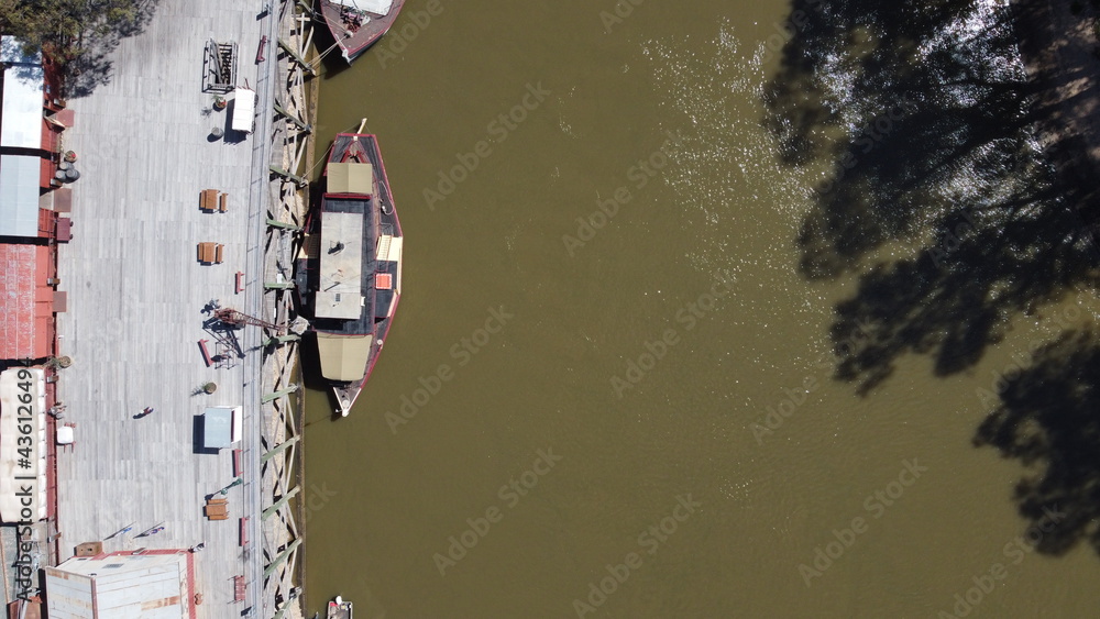 overhead top down view of old steam powered boats running tourists ...