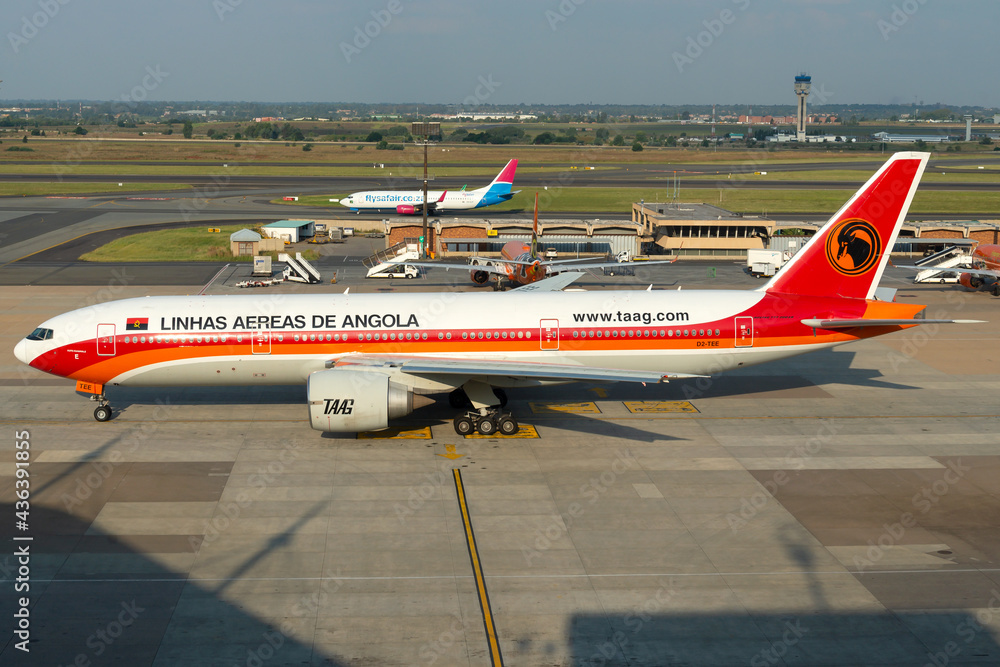 TAAG Angola Airlines Boeing 777 airplane taxiing at OR Tambo Airport in ...