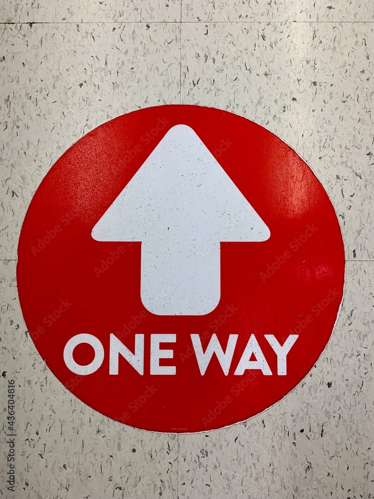 One Way sign with arrow, white text on red background, outstanding ...