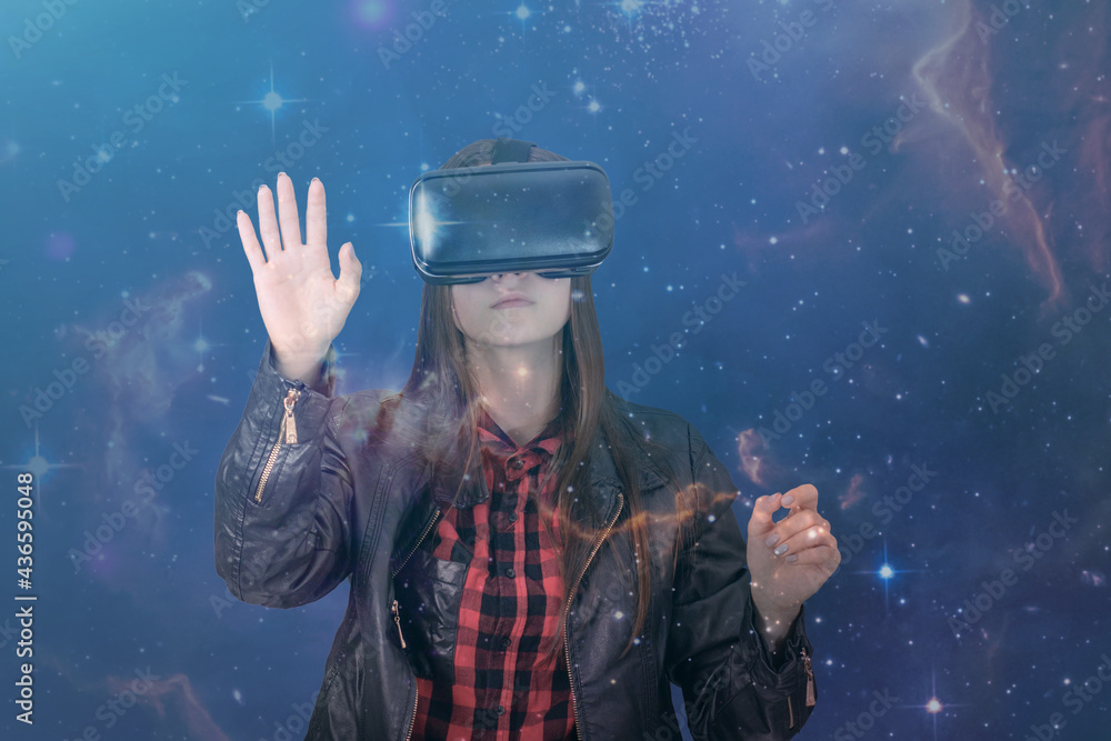 Girl in glasses of virtual reality. Augmented reality, vr, future technology, game concept ...