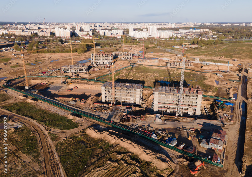 Tower cranes in action at construction site. Crane during formworks ...