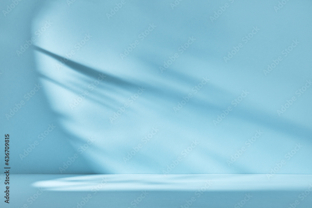 Abstract blue background with drop shadow and light. Backdrop for ...
