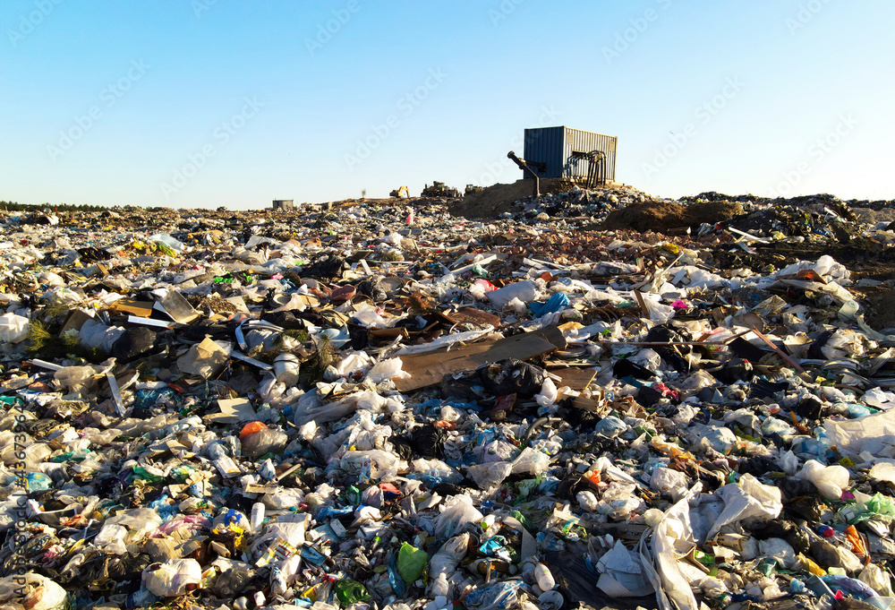 Garbage dump with plastic bags and food waste. Trash disposal ...