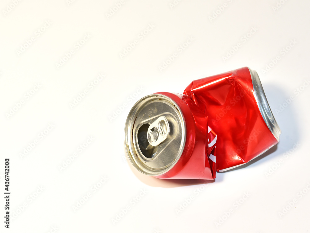 Empty crumpled can from a sweet carbonated drink. Aluminum can trash ...