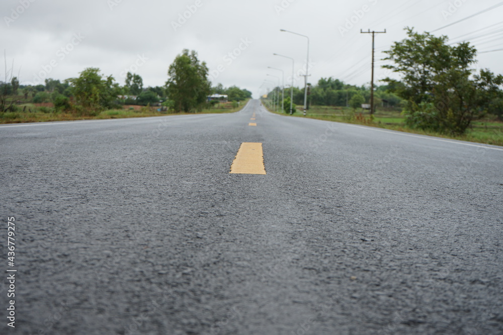 Road in the rain, be careful of slippery roads while driving. Stock ...