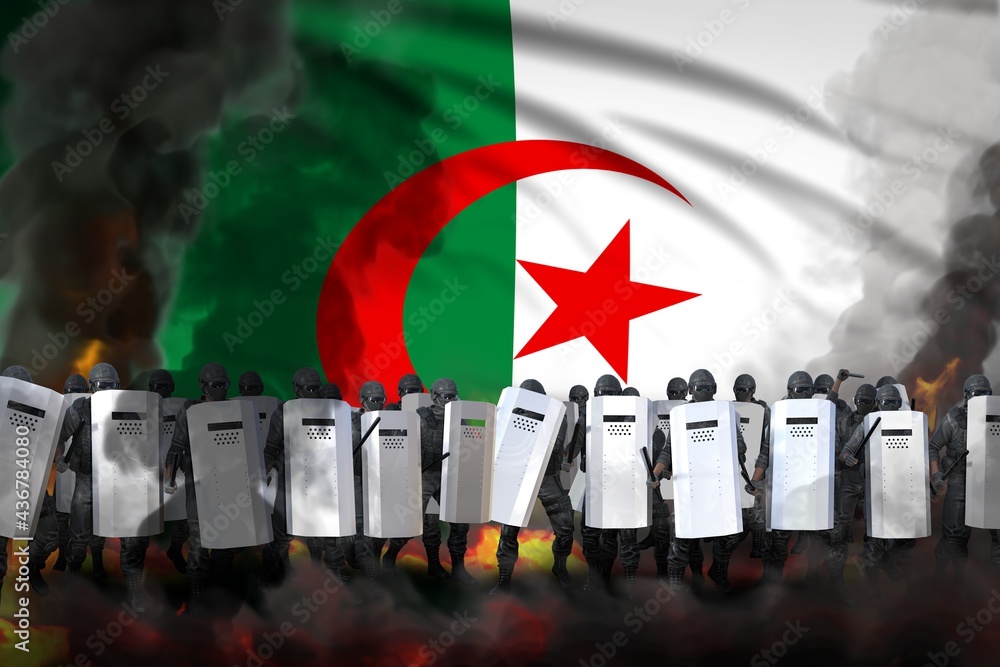 Algeria protest fighting concept, police officers in heavy smoke and ...