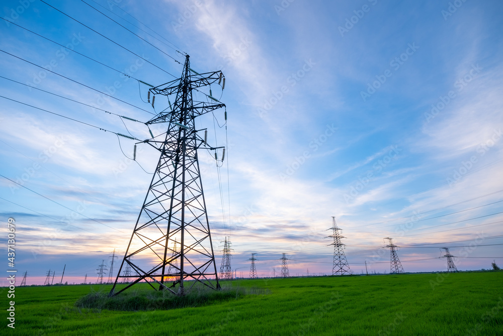 High-voltage power lines. Transmission of electricity by means of poles ...