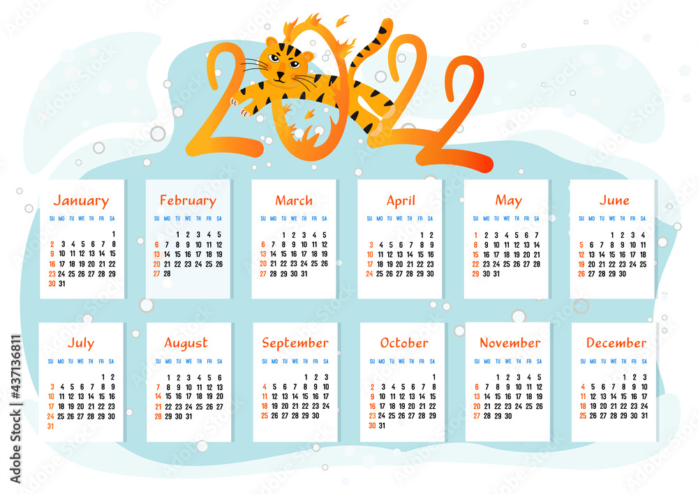 Wall calendar for 2022 with fiery tiger. The tiger cub jumps into the ...