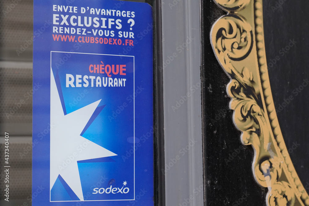 Sodexo brand logo and text sign front of bar door window restaurant ...