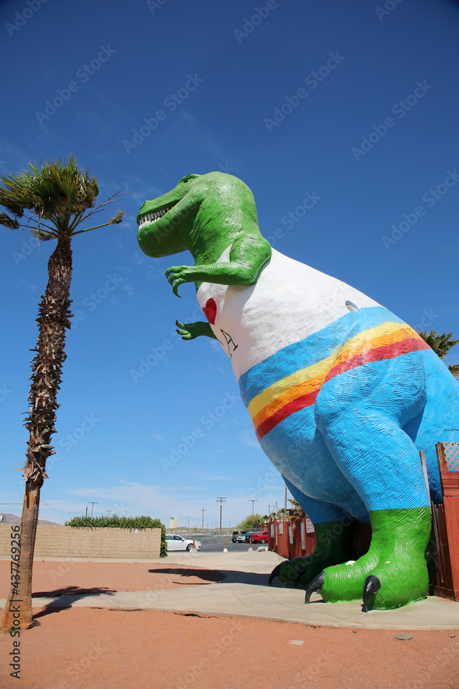 June 6 2021 - CABAZON, CALIFORNIA USA: A t-rex statue looks up into the ...