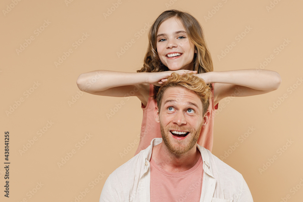 Young smiling happy parent man with child teen girl in casual clothes ...